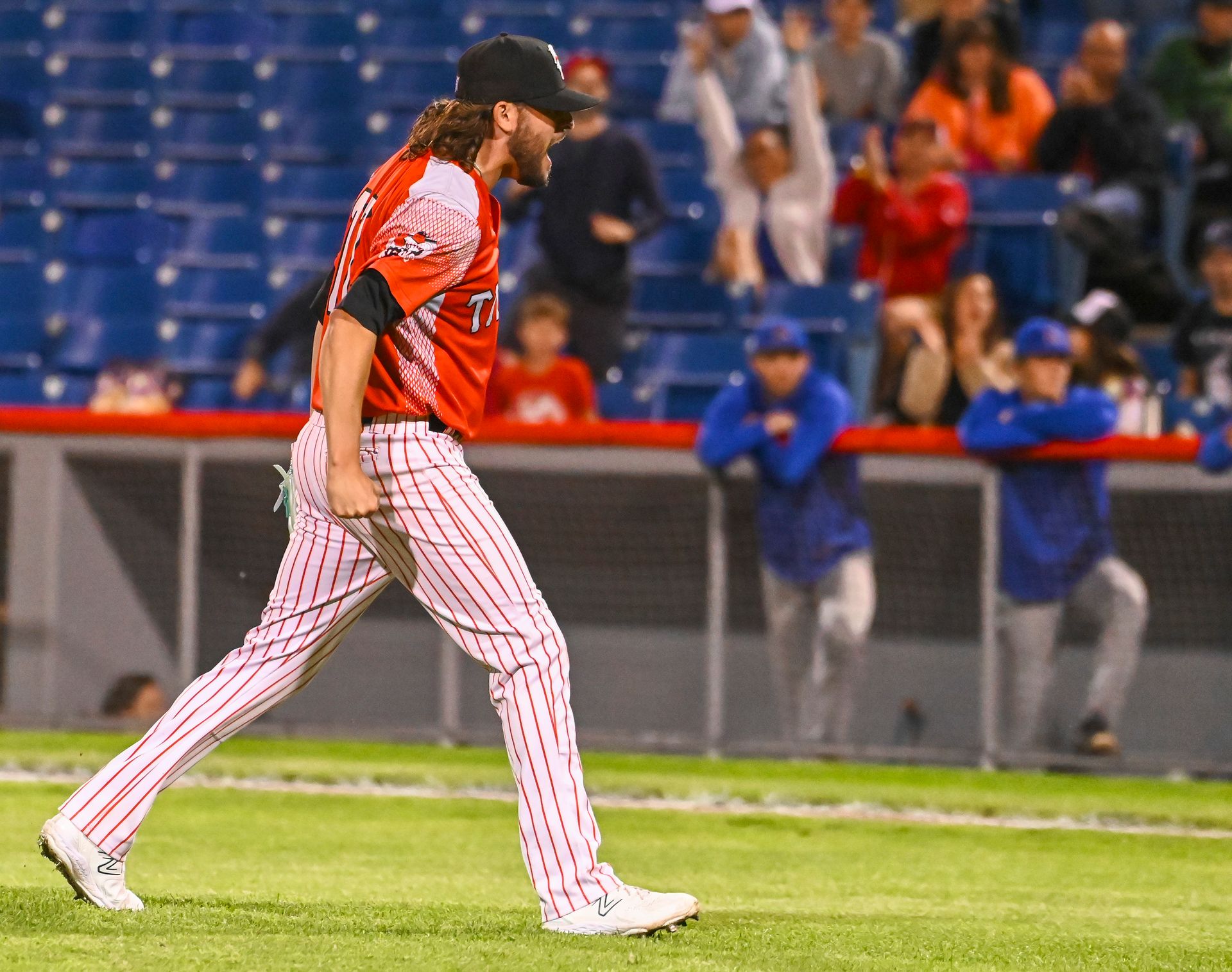 Titans Split Emotional Twin Bill With Boulders