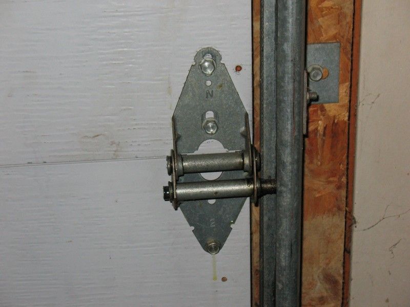 Why Is My Garage Door Uneven or Sagging on One Side? Causes & Fixes