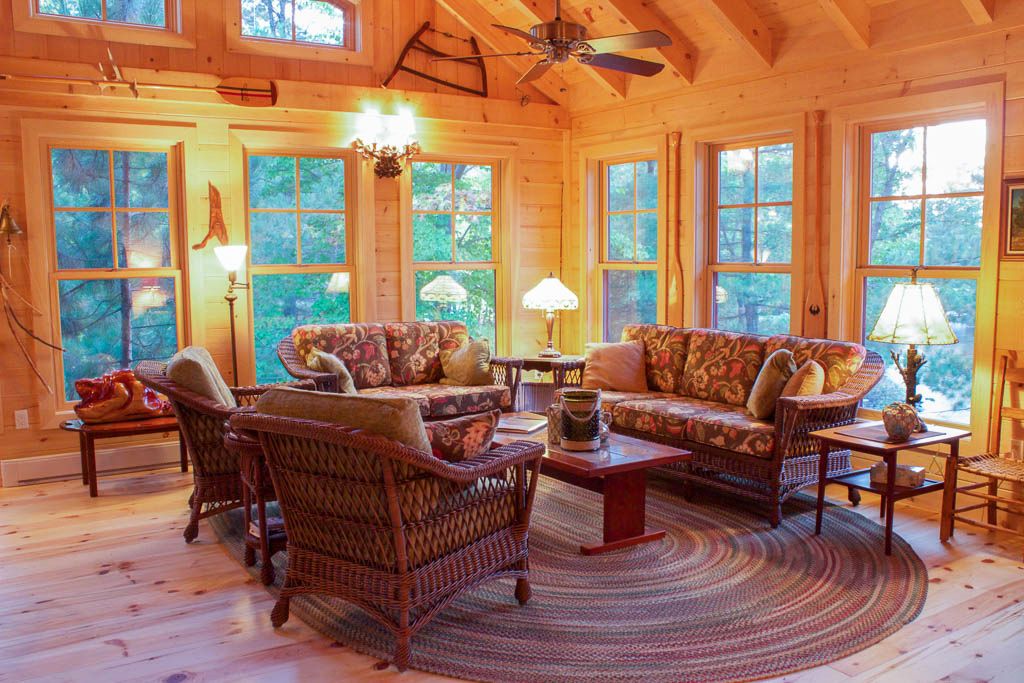 Muskoka Rooms are a welcoming feature in custom cottages.