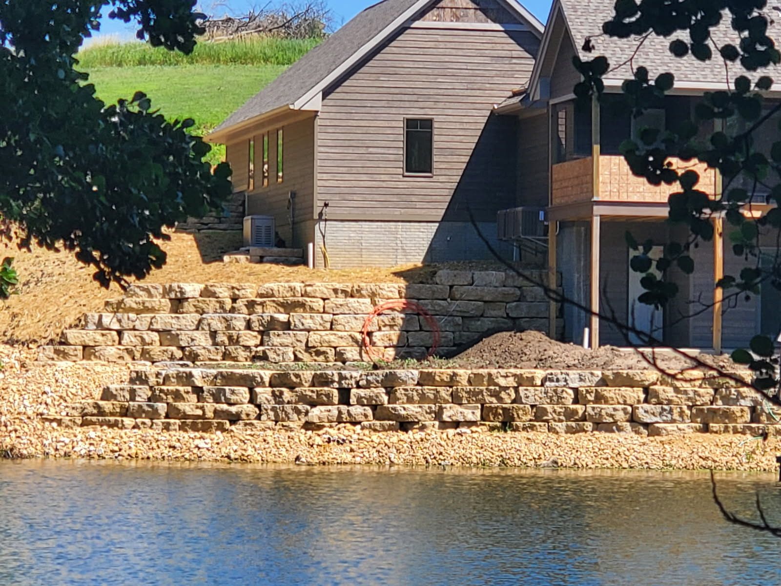 Natural Stone Retaining Wall | Exquisite Scapes Inc