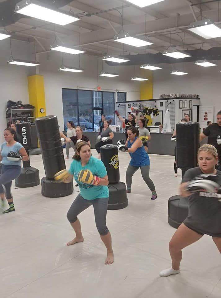 Empowering Fitness | Champions MMA | Lakeland, FL