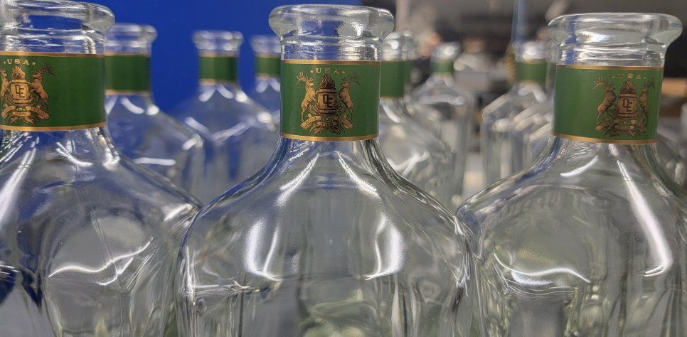 Bottle Neck Labeling for Liquor