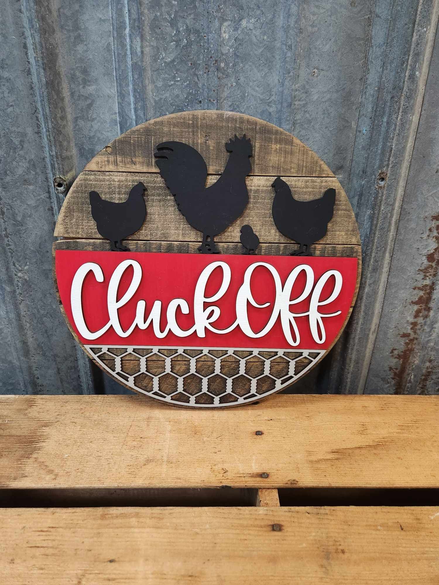 Round Cluck off sign