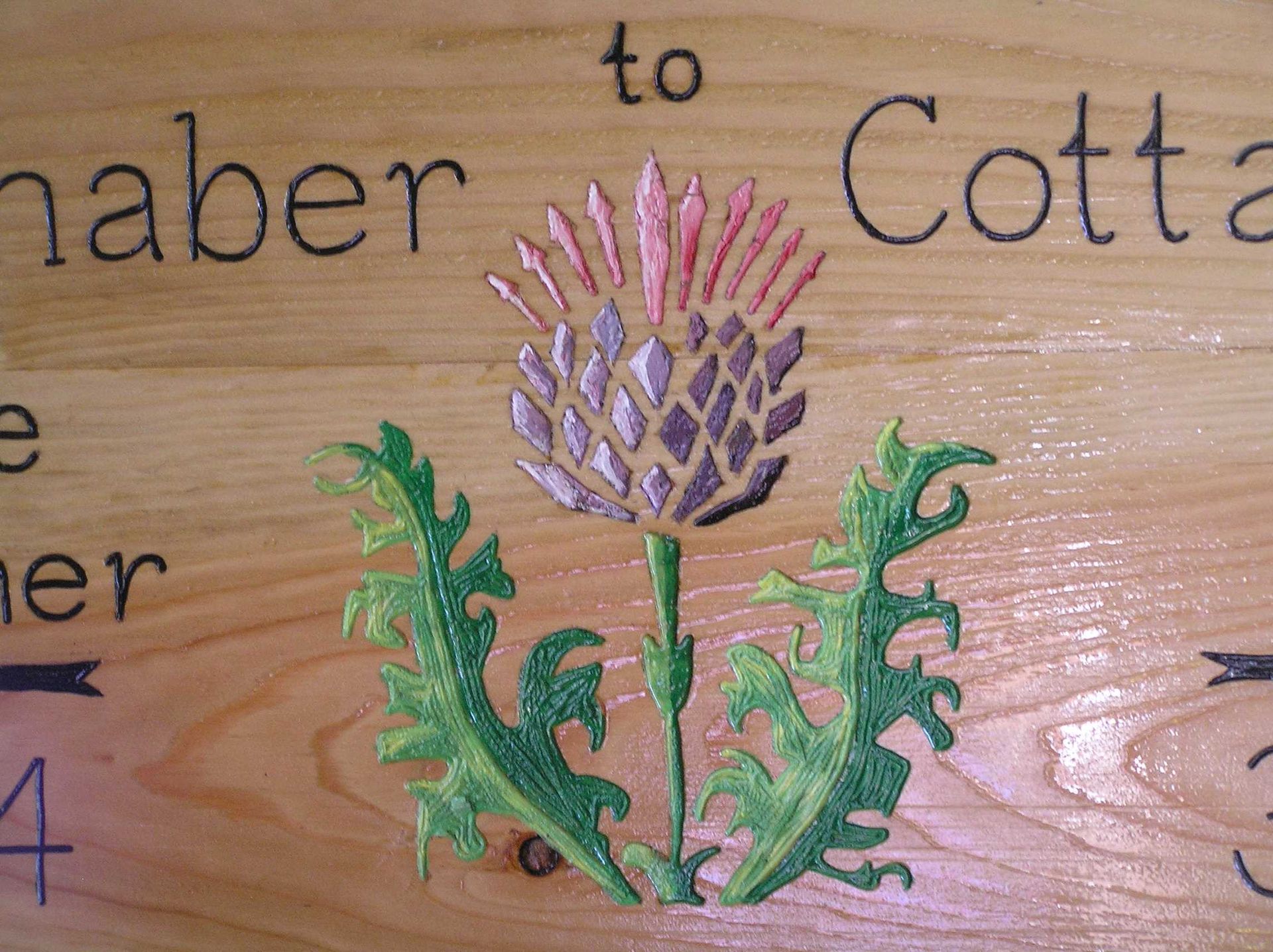 House signs Scotland, wooden house signs in Scotland.