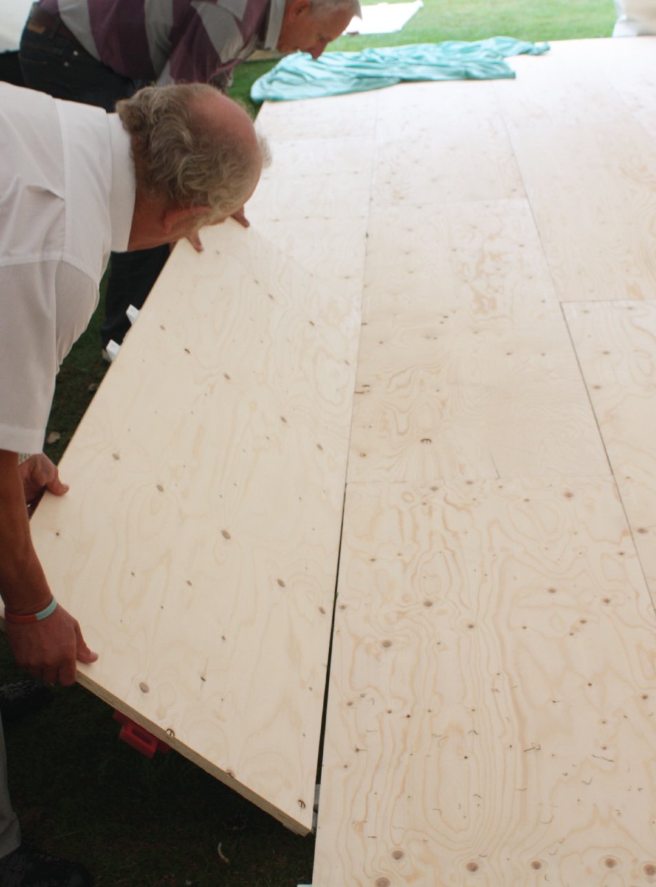 Interlocking plywood panels for Marquee Floors