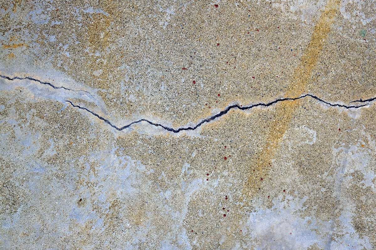 Cracks in Concrete Floor: Types, Causes & Treatment