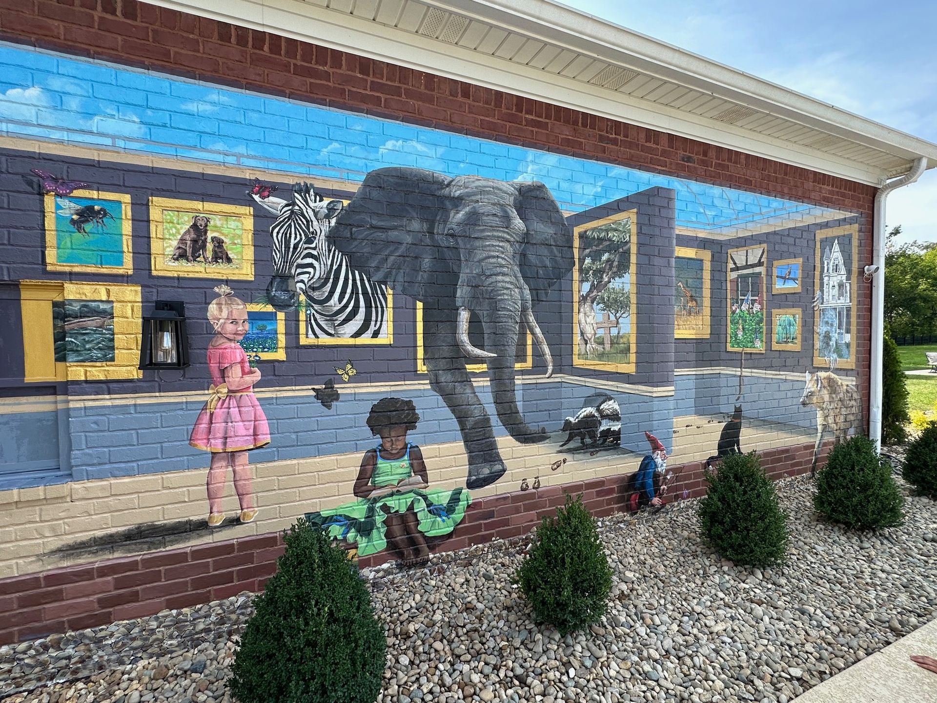 Characters in Her Books Painted on This Exterior Brick Wall
