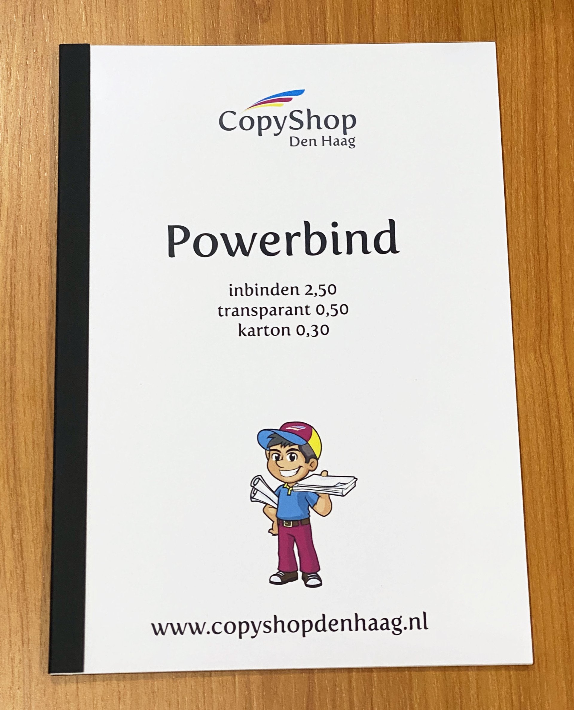 Inbinden met een lijmrug bij CopyShop Den Haag (Beatrixkwartier)