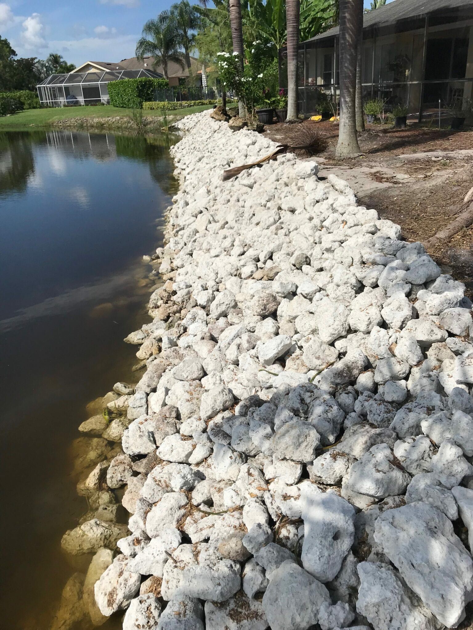 Golf Course Lake Restoration, Rip Rap, and ADS Drain Pipes Naples