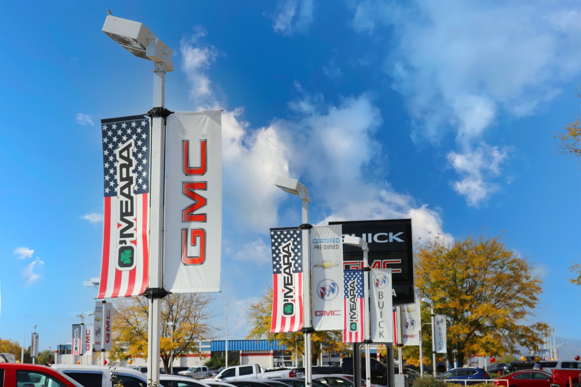 Stand Out with Vibrant Car Dealership Flags & Banners