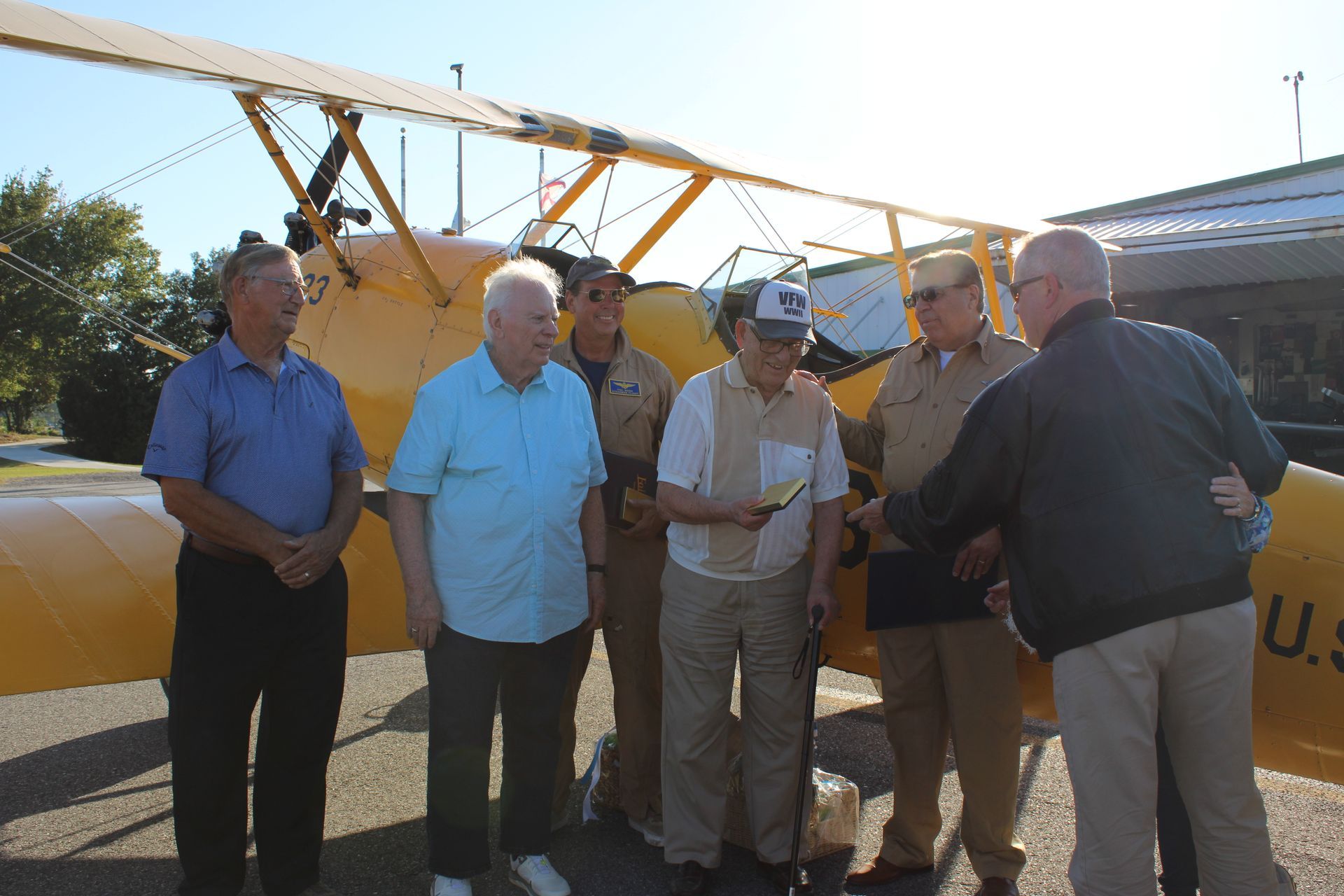 WWII Veteran Honored in Foley as Museum's Historic Biplane Arrives