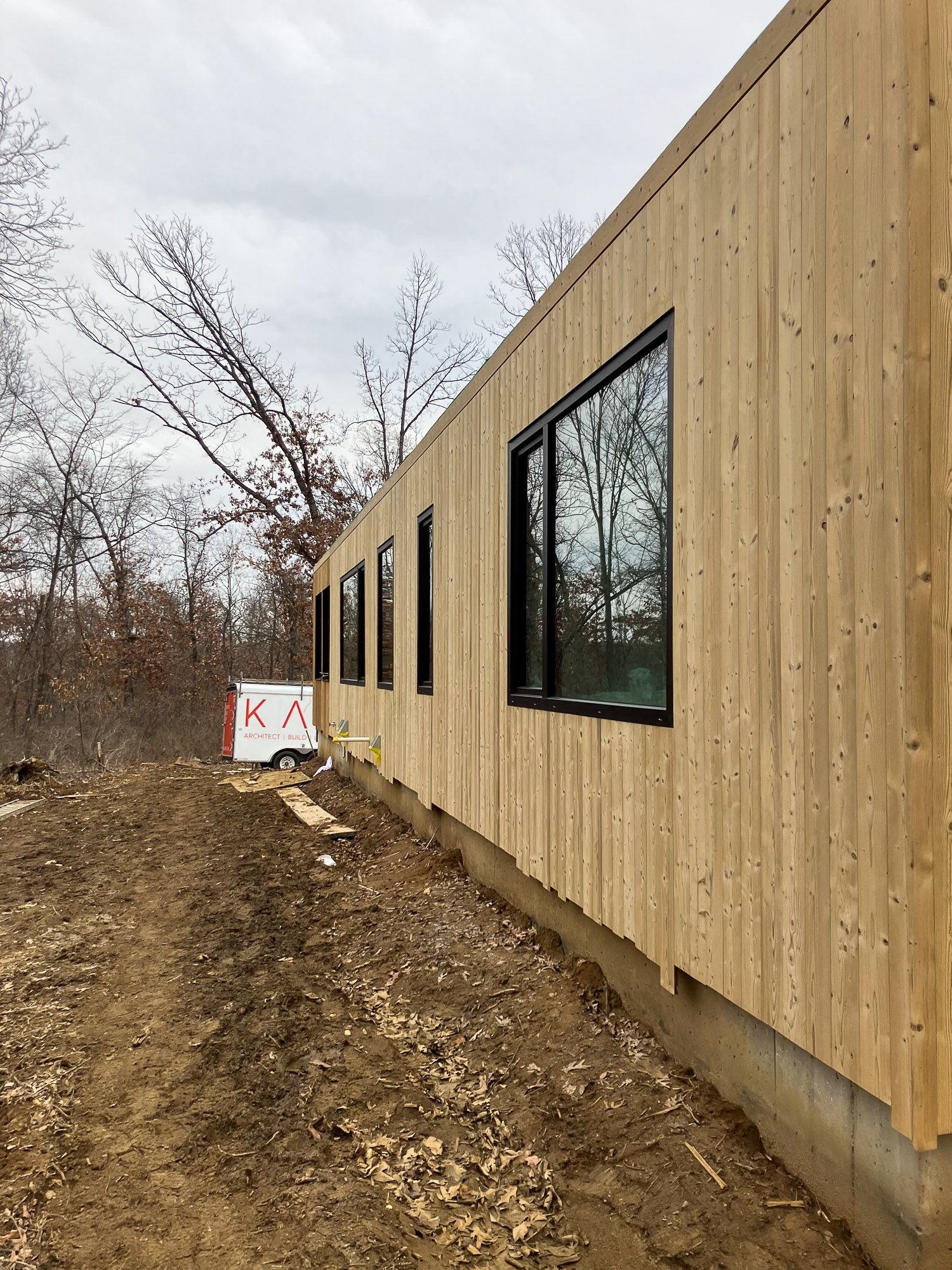 Sustainable + Durable Wood Siding Installation | Custom Home