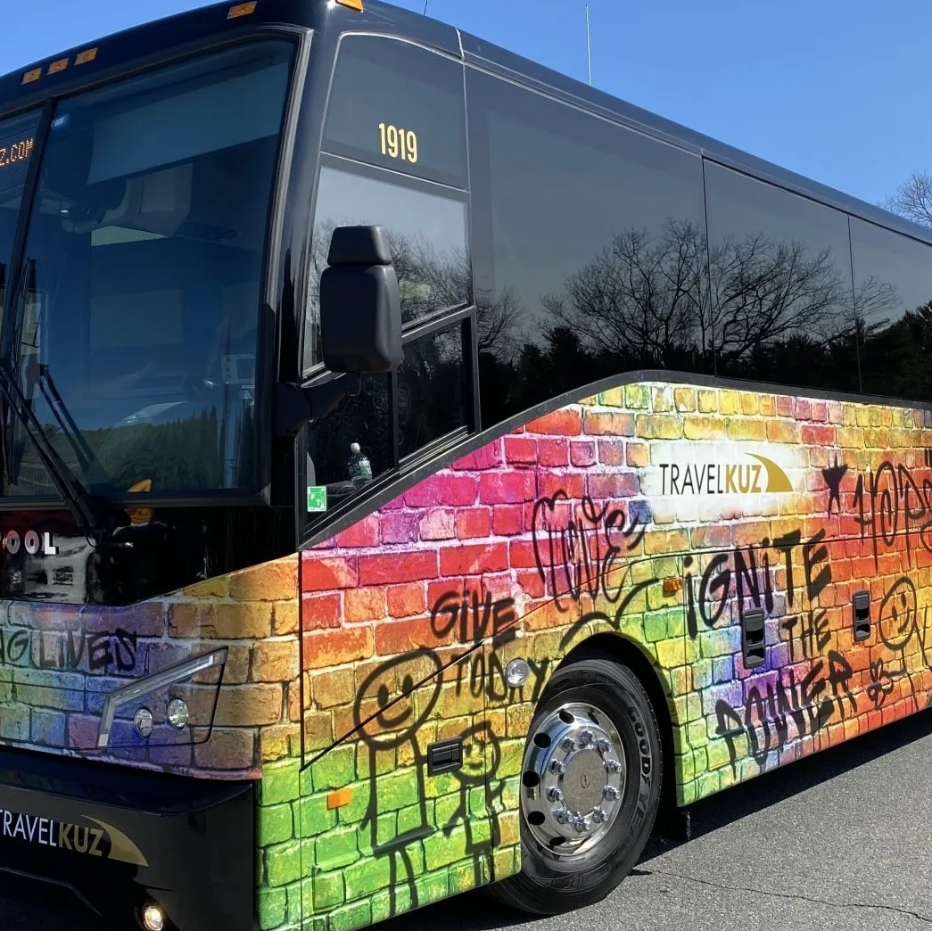 Travel Kuz Motor Coach, Limousine, and School Bus Charters