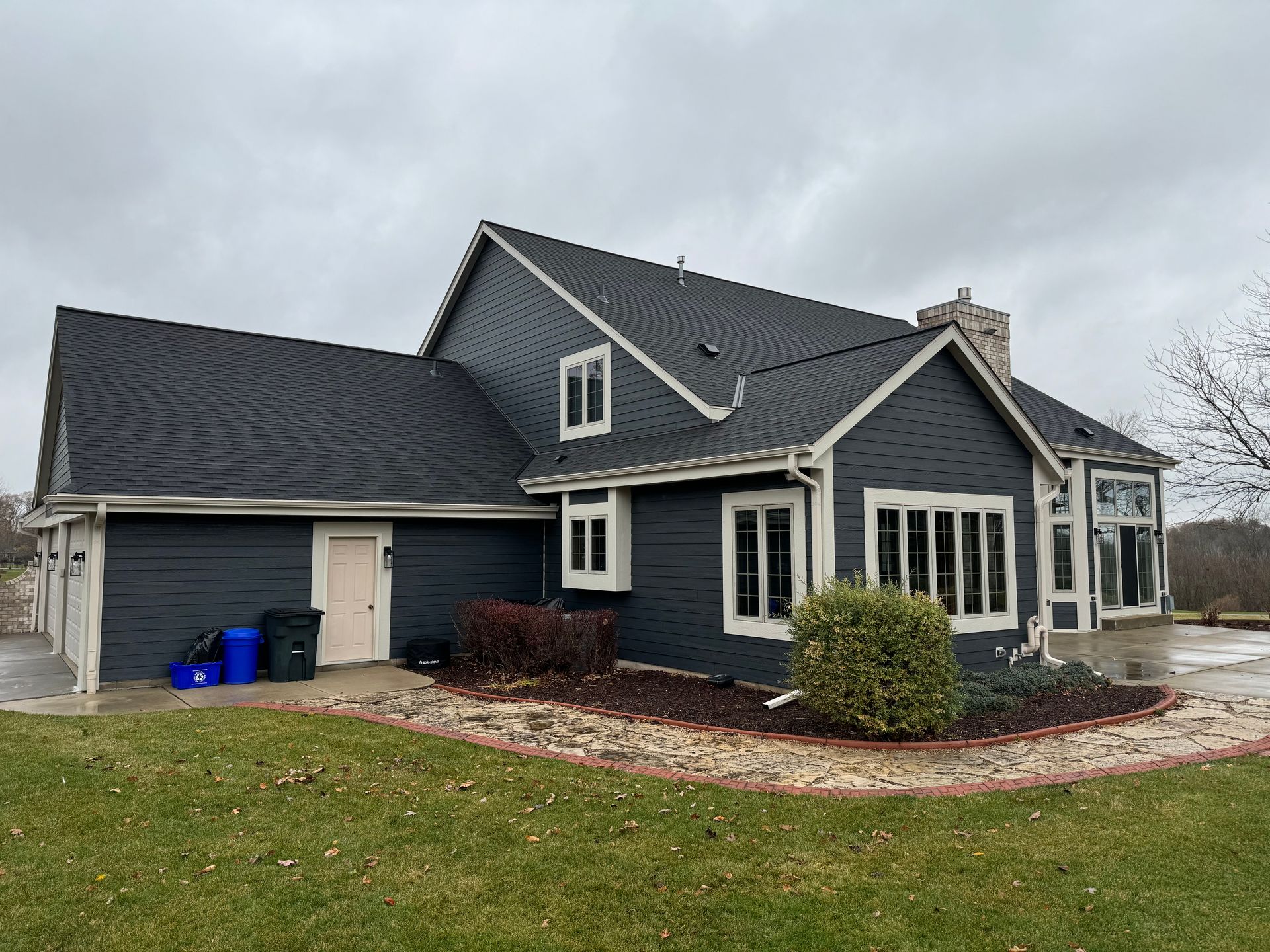 Transformation with Majestic Carved Wood Vinyl Siding in Everest
