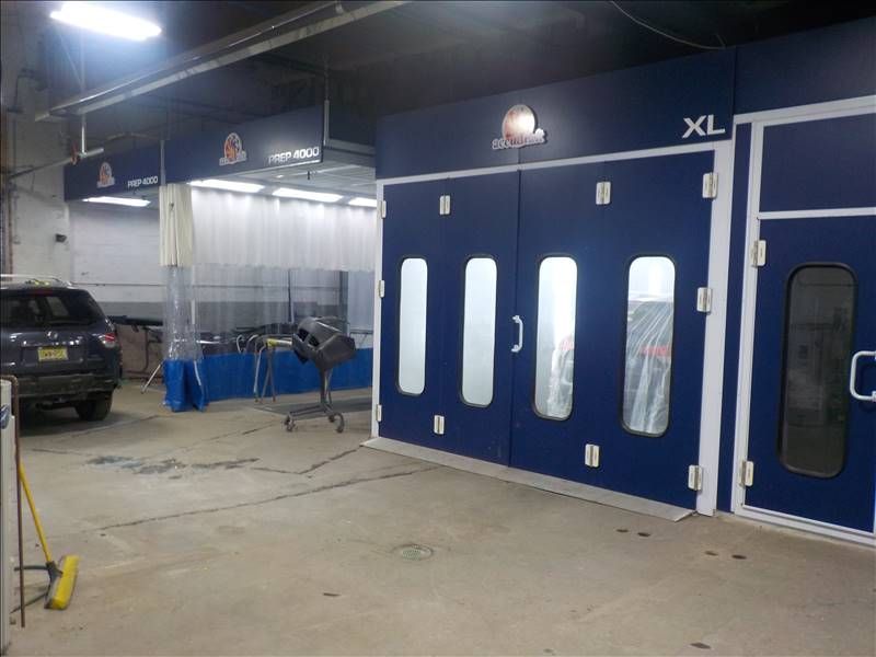 MODERN AUTO BODY, INC.