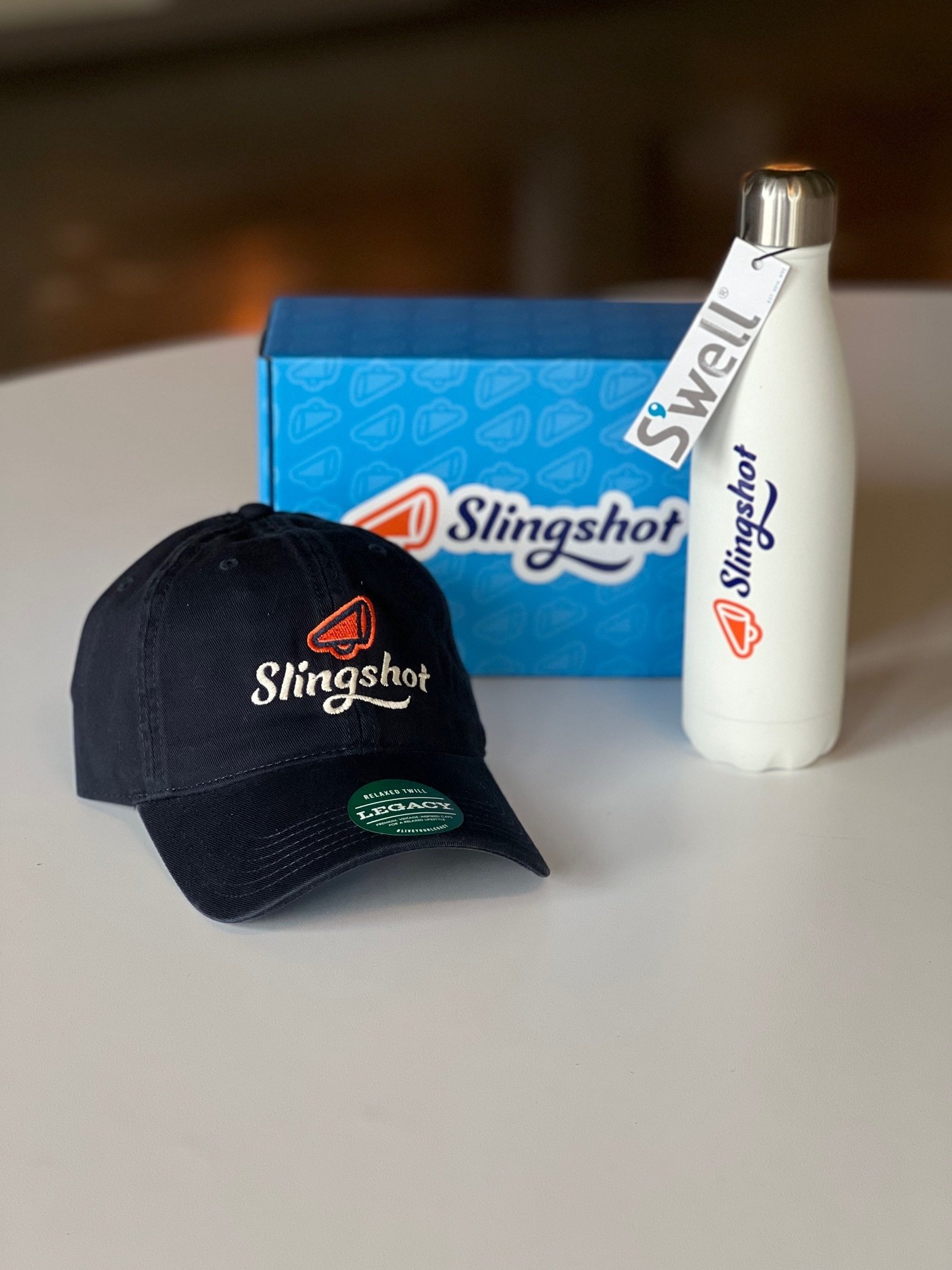 Slingshot - About Us