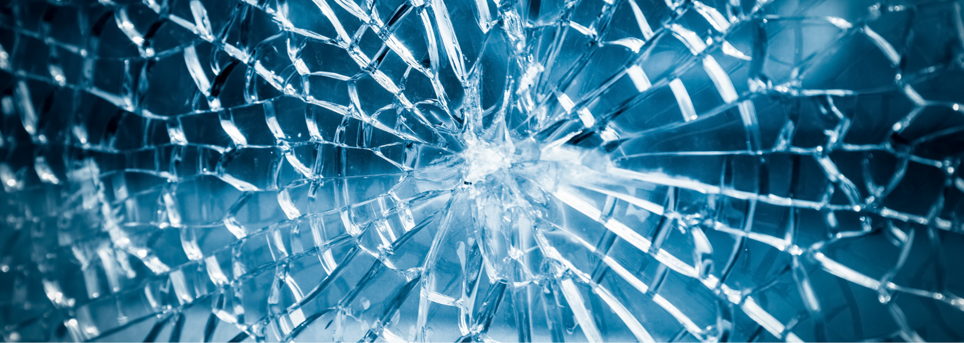 Why does toughened glass shatter into small pieces?