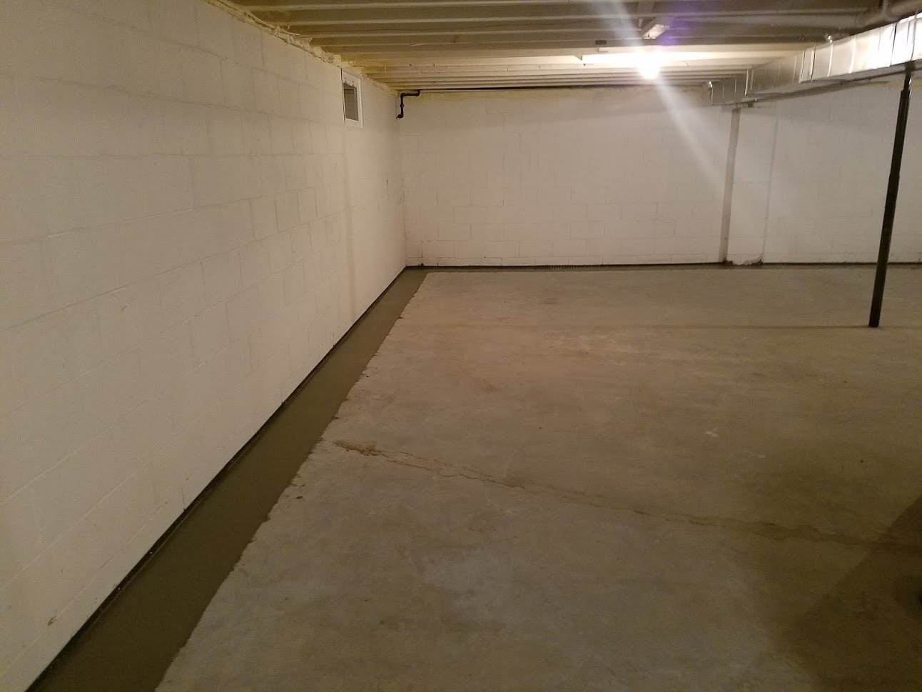 Interior Drain System | Pouwels Basement | De Pere, Wisconsin