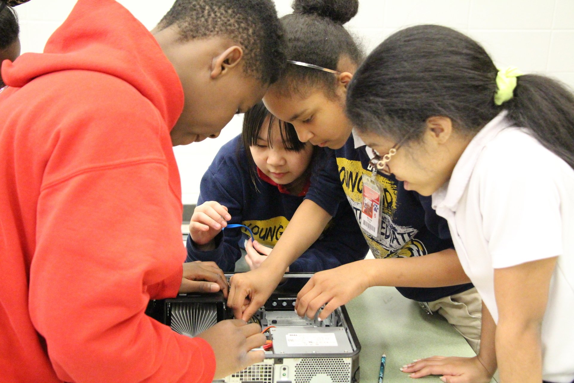 Compudopt Dallas. Empowering youth through technology.