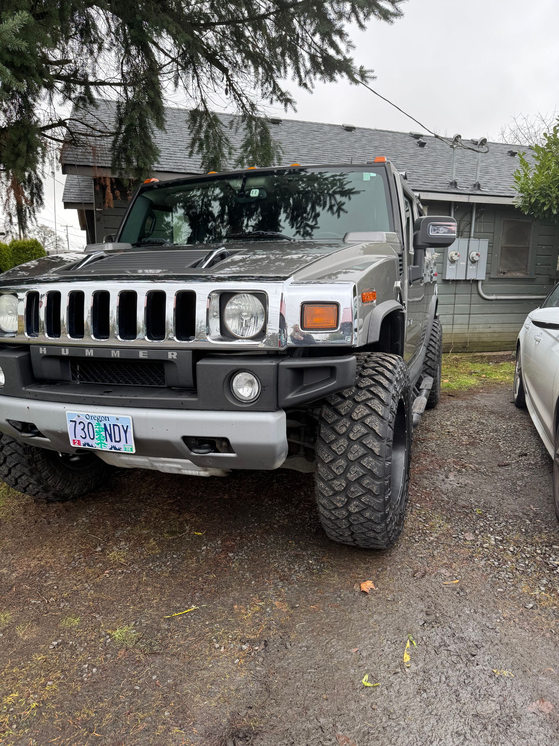 small puddle under car