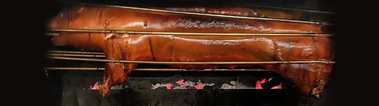 "The Musing of Pig Roasting at Martin's Roast A Pig"