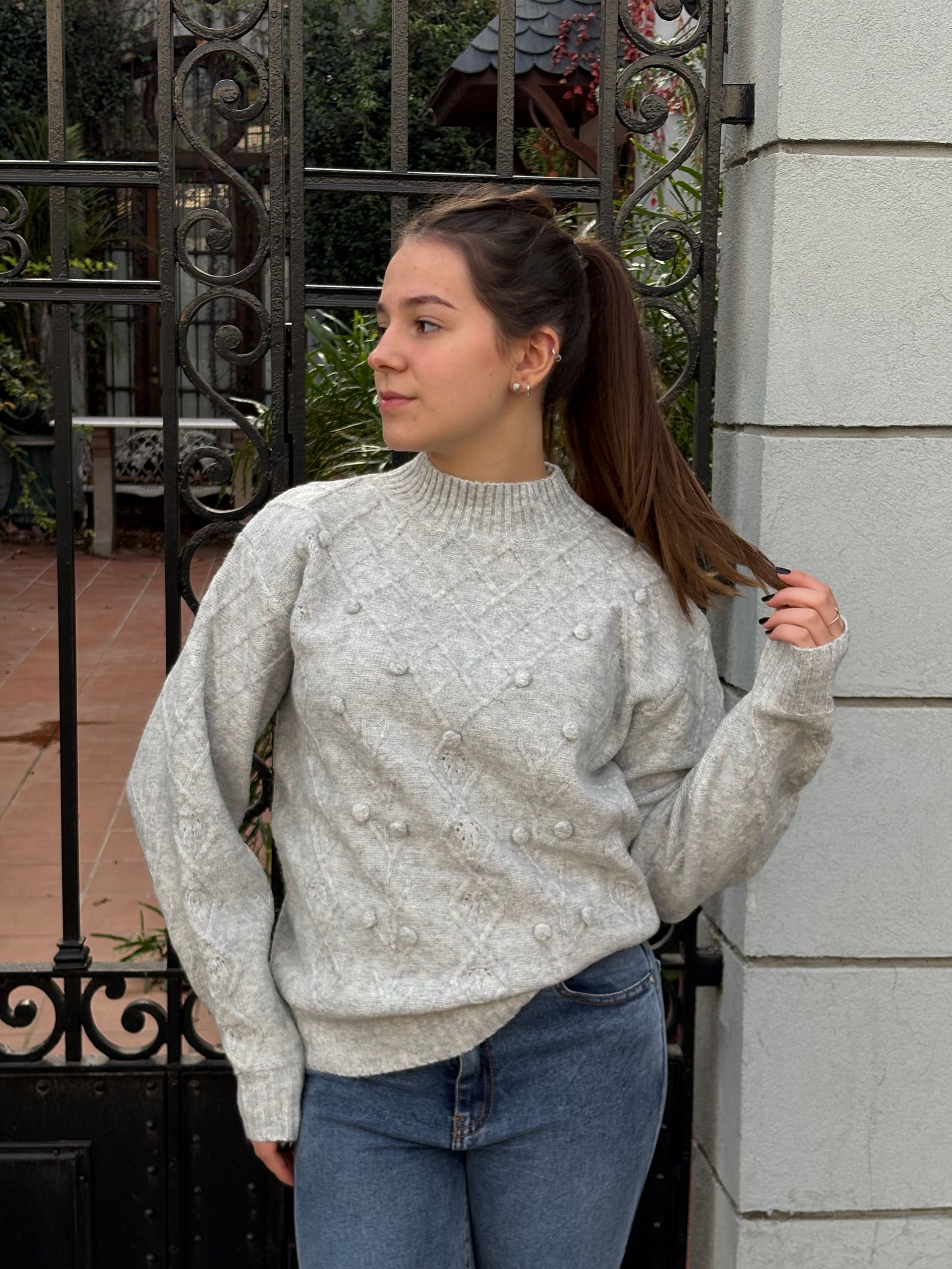 Suéter con detalles