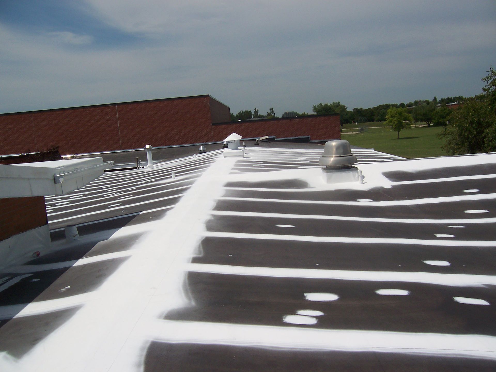 Commercial Roof Coating System | Spray Seal Inc. | Lowa