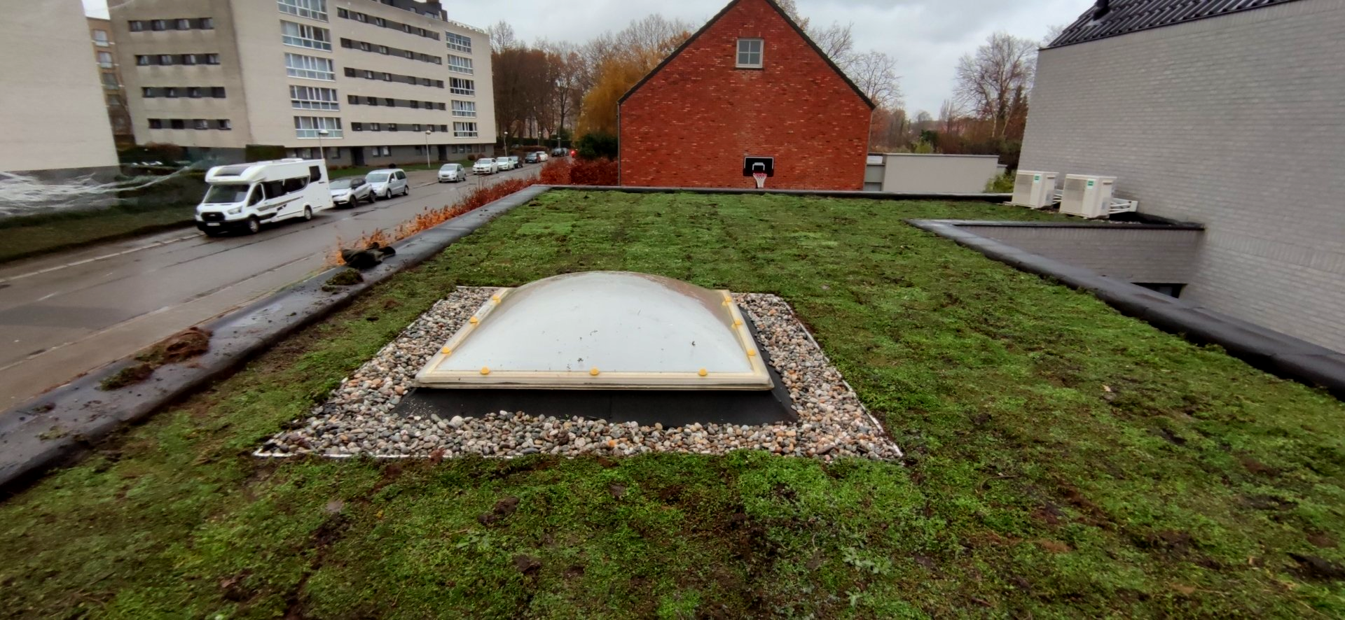 Realistatie van groendaken en daken met grind