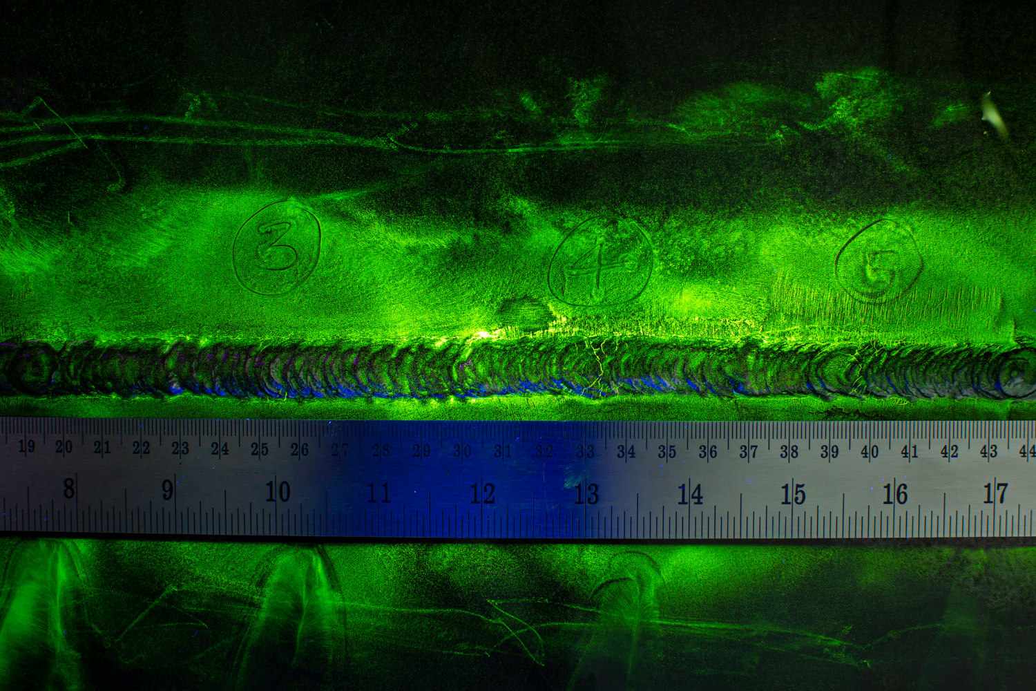Wet Fluorescent MPI Testing by Steel City NDT