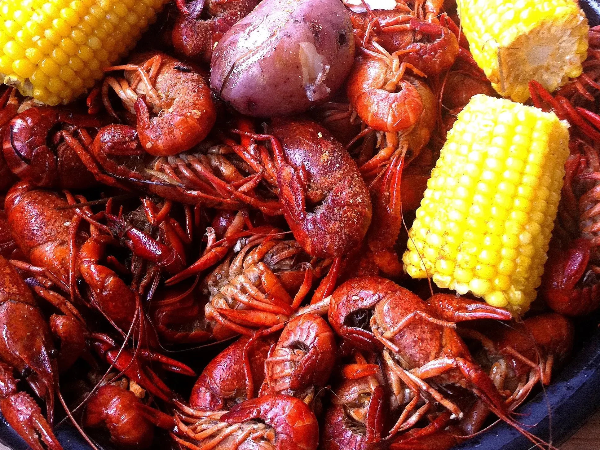 National Crawfish Day Has Everyone With "Messy Hands And Happy Hearts"