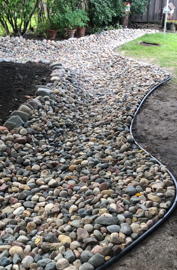 Outdoor drainage fix wet yard repair project Edina MN