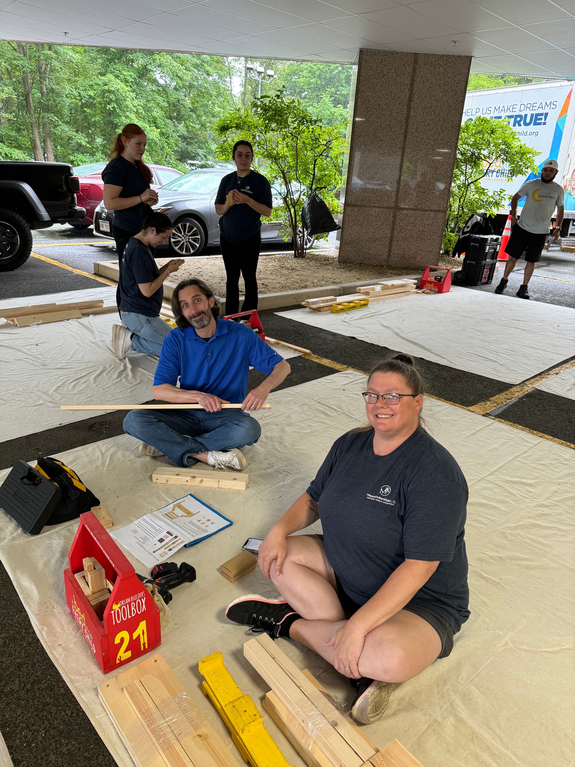 Building Dreams: MBK builds 10 beds for "A Bed for Every Child"