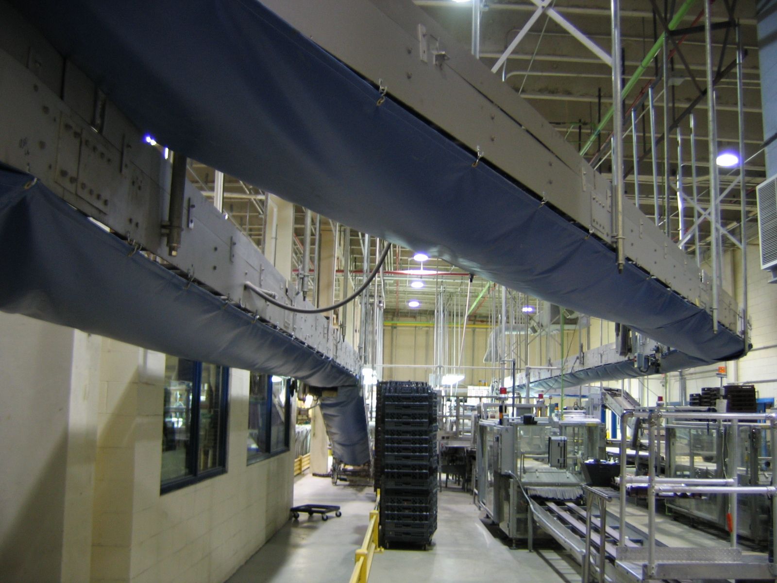 Dotro Tarps | Enhance Cleanliness & Safety in Conveyor Systems