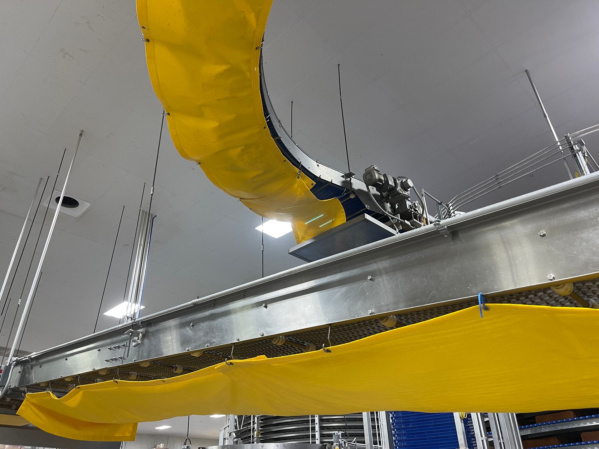 Dotro Tarps | Enhance Cleanliness & Safety in Conveyor Systems