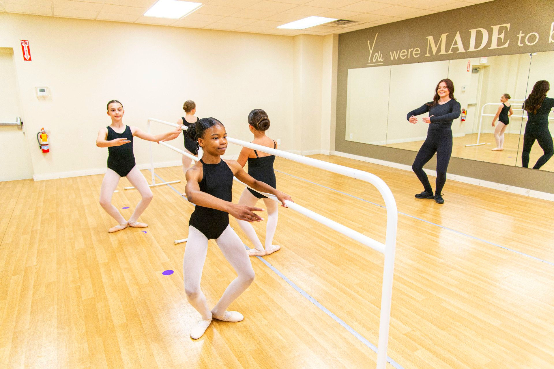 About | Above the Barre | Gymnastics Classes | Tumbling