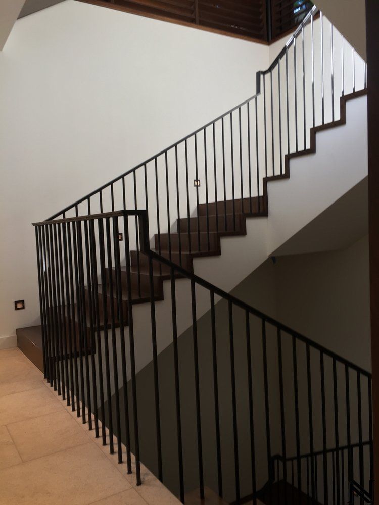 Modern Iron Stair Railings | Naddour's Custom Metalworks