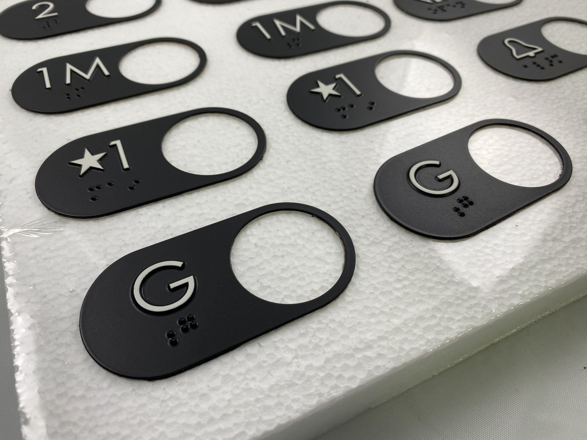 ELEVATOR BUTTON PLATES/SURROUNDS | VisionMark Nameplate Company