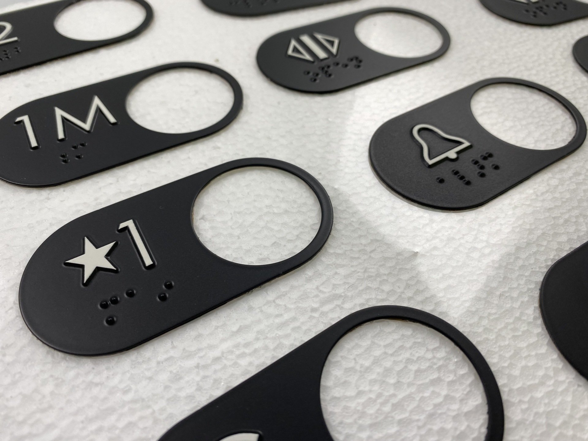 ELEVATOR BUTTON PLATES/SURROUNDS | VisionMark Nameplate Company