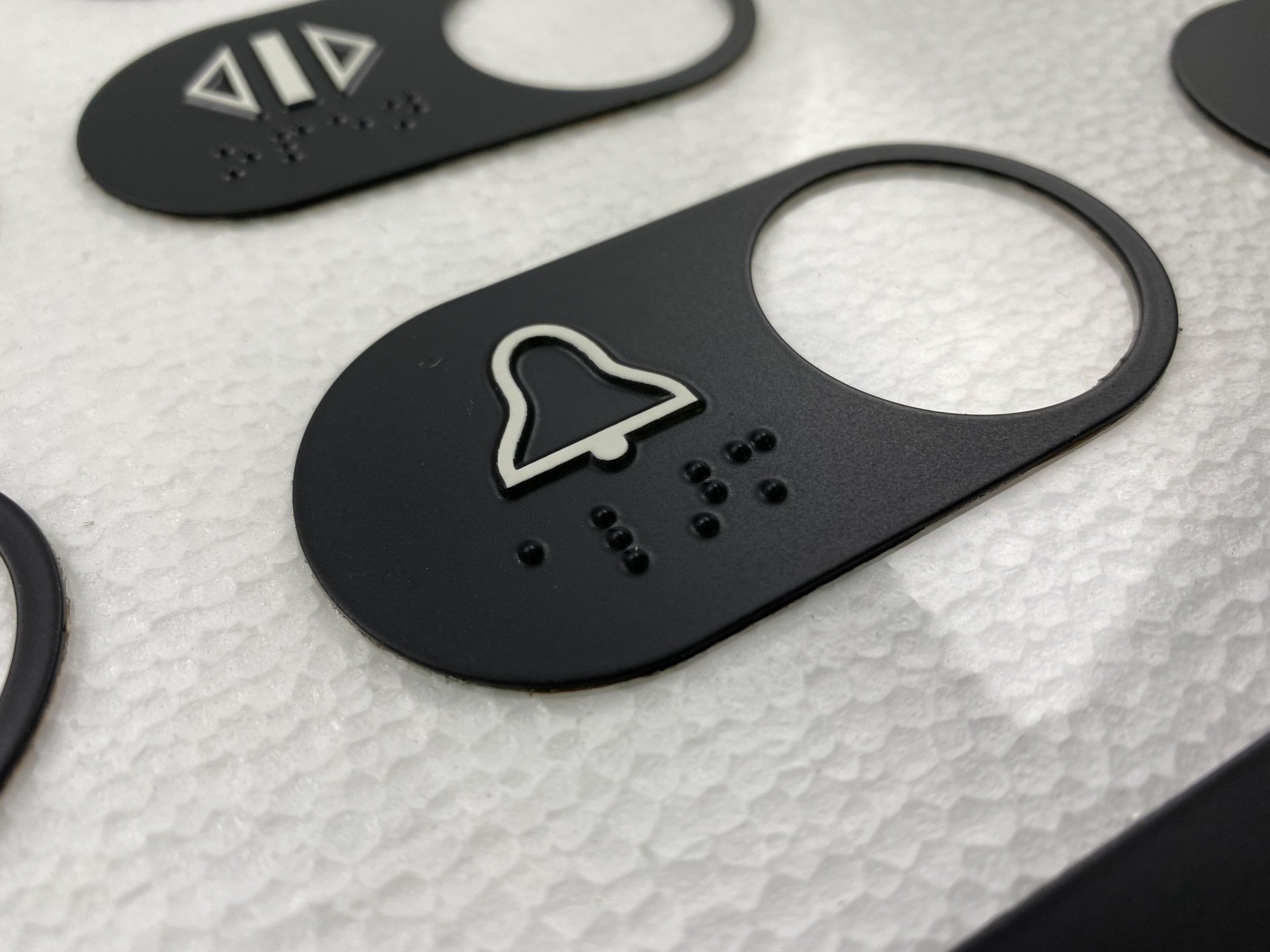 ELEVATOR BUTTON PLATES/SURROUNDS | VisionMark Nameplate Company