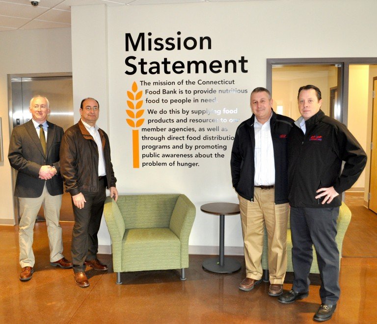 All American Waste presented a donation to the Connecticut Food Bank