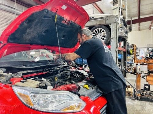 Why Does My Car Creak When Going Over Bumps?