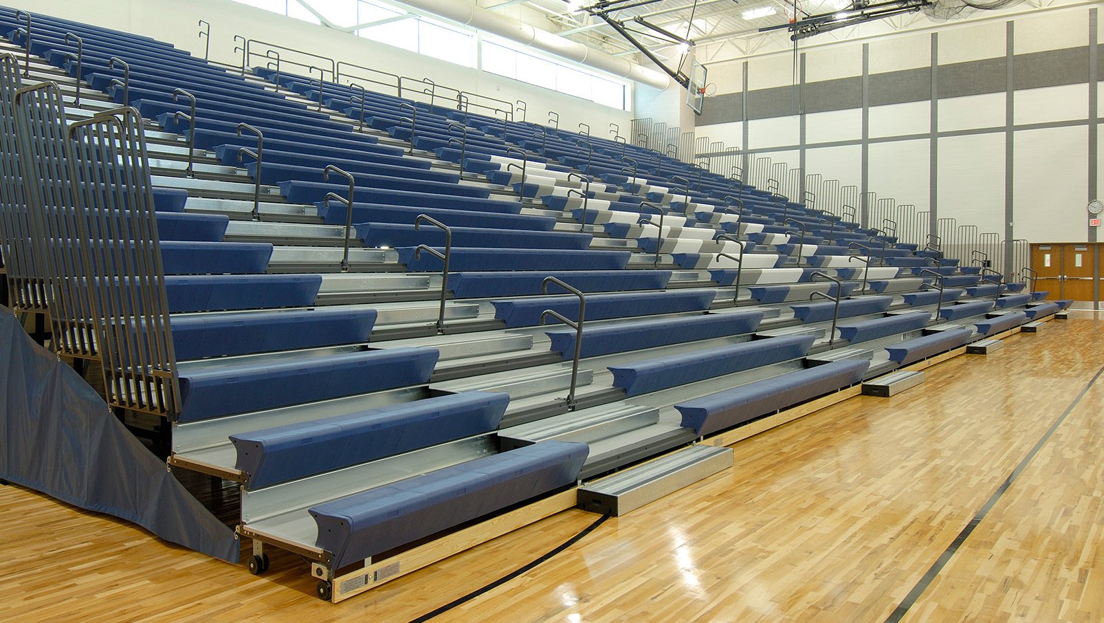 Interkal | Aisle Rail Systems for Telescopic Bleachers