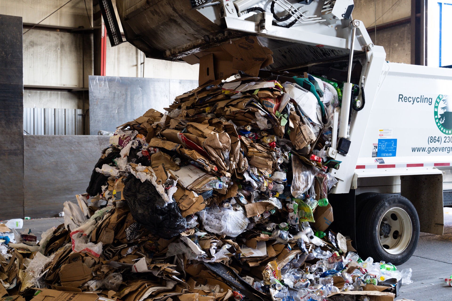 How do waste companies responsibly bury & manage incoming trash?