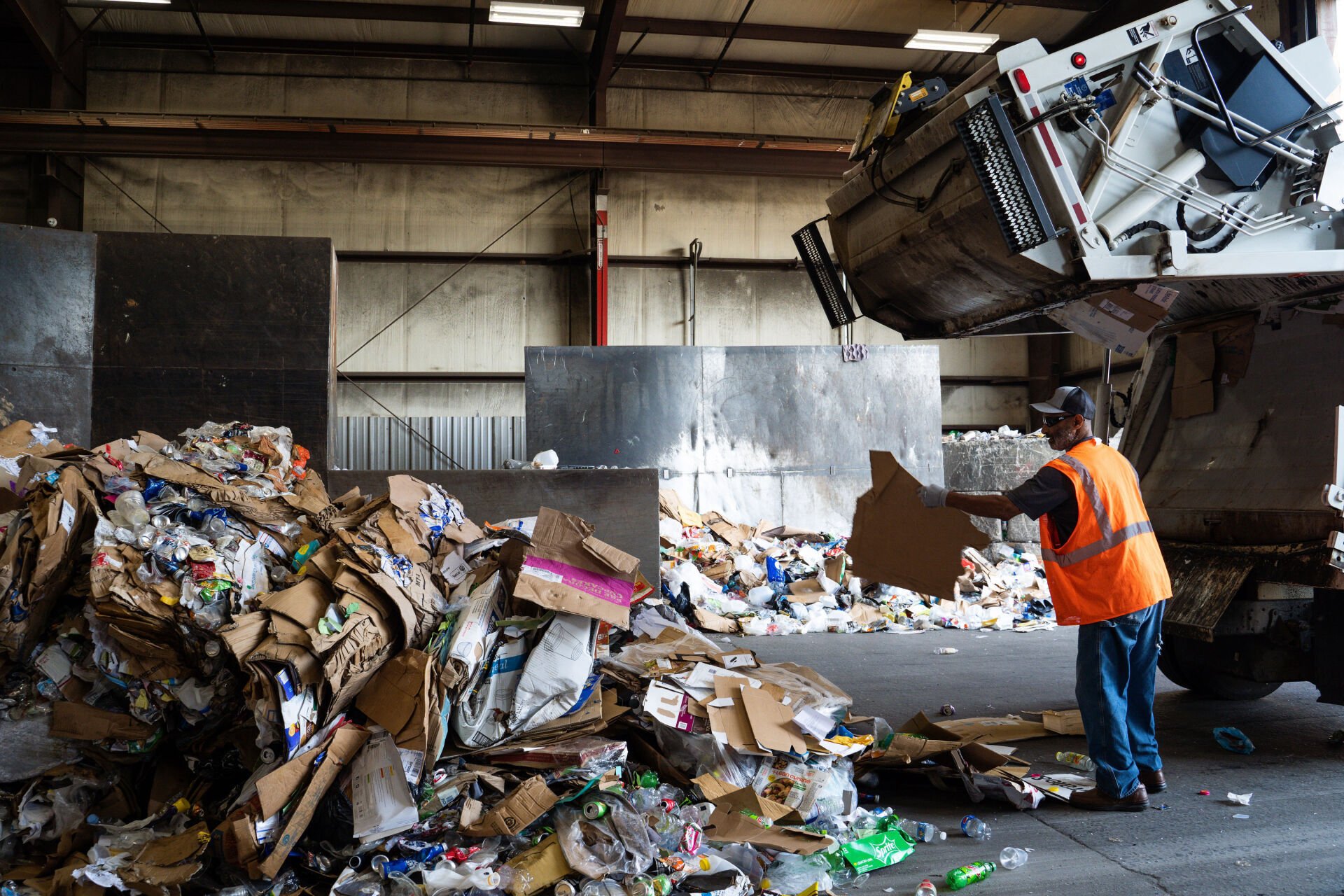 How do waste companies responsibly bury & manage incoming trash?