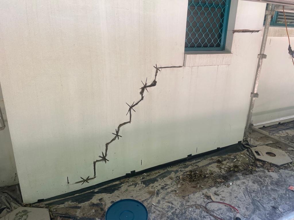 BUILDING FACADE CRACK REPAIR, RENDER & REPAINT