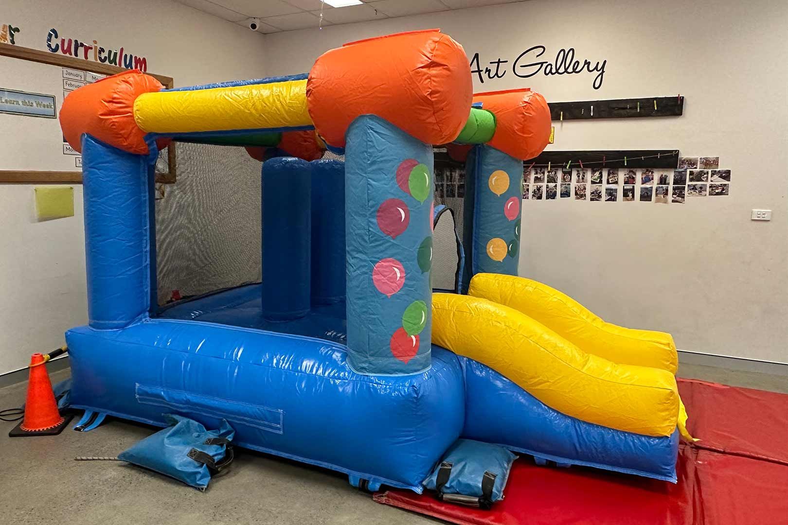 JUMPING CASTLES WITH SLIDES